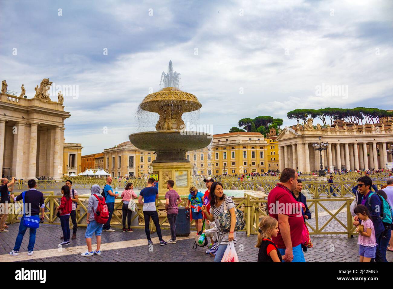 Crowded St. Peter`s square,Piazza San Pietro Vatican with fountains ...