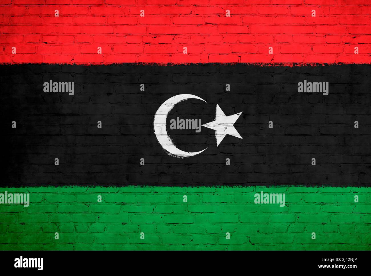 Libya flag painted on brick wall. National country flag background ...