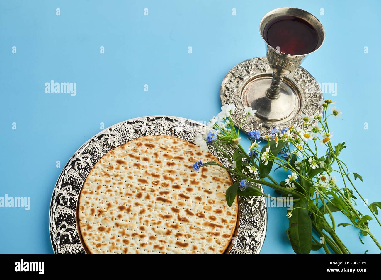 Pesah celebration concept, jewish Passover holiday. Matzah and red ...