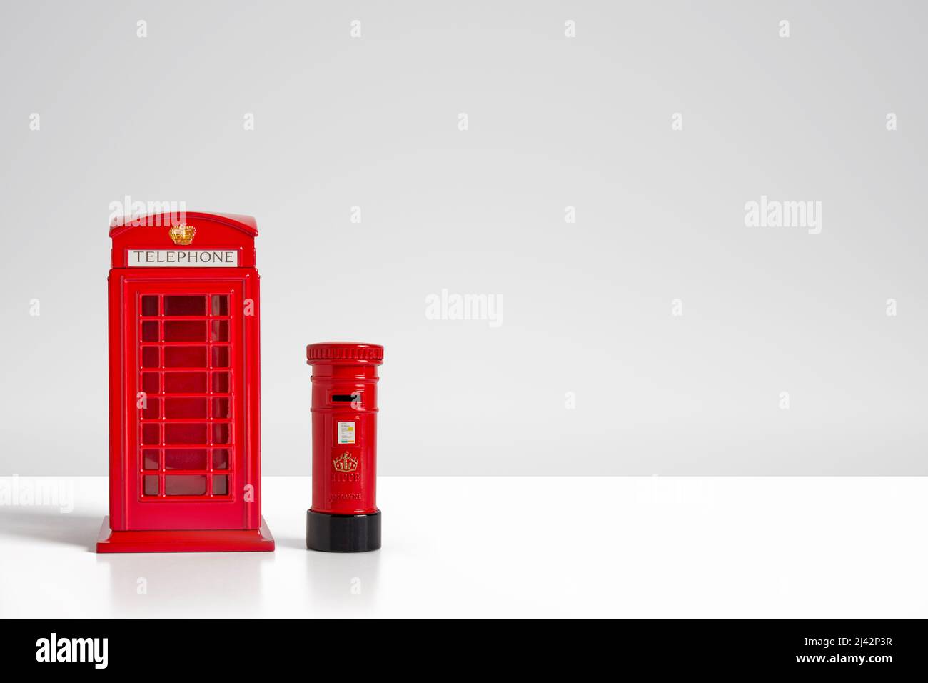 Red model telephone and post box London concept Stock Photo - Alamy