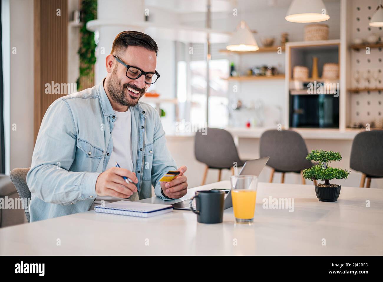 Paying taxes credit card hi-res stock photography and images - Alamy