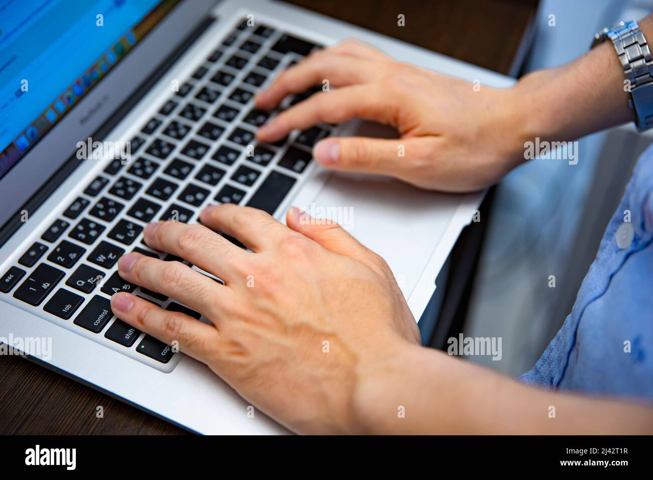 A typing hands on the laptop computer Stock Photo - Alamy