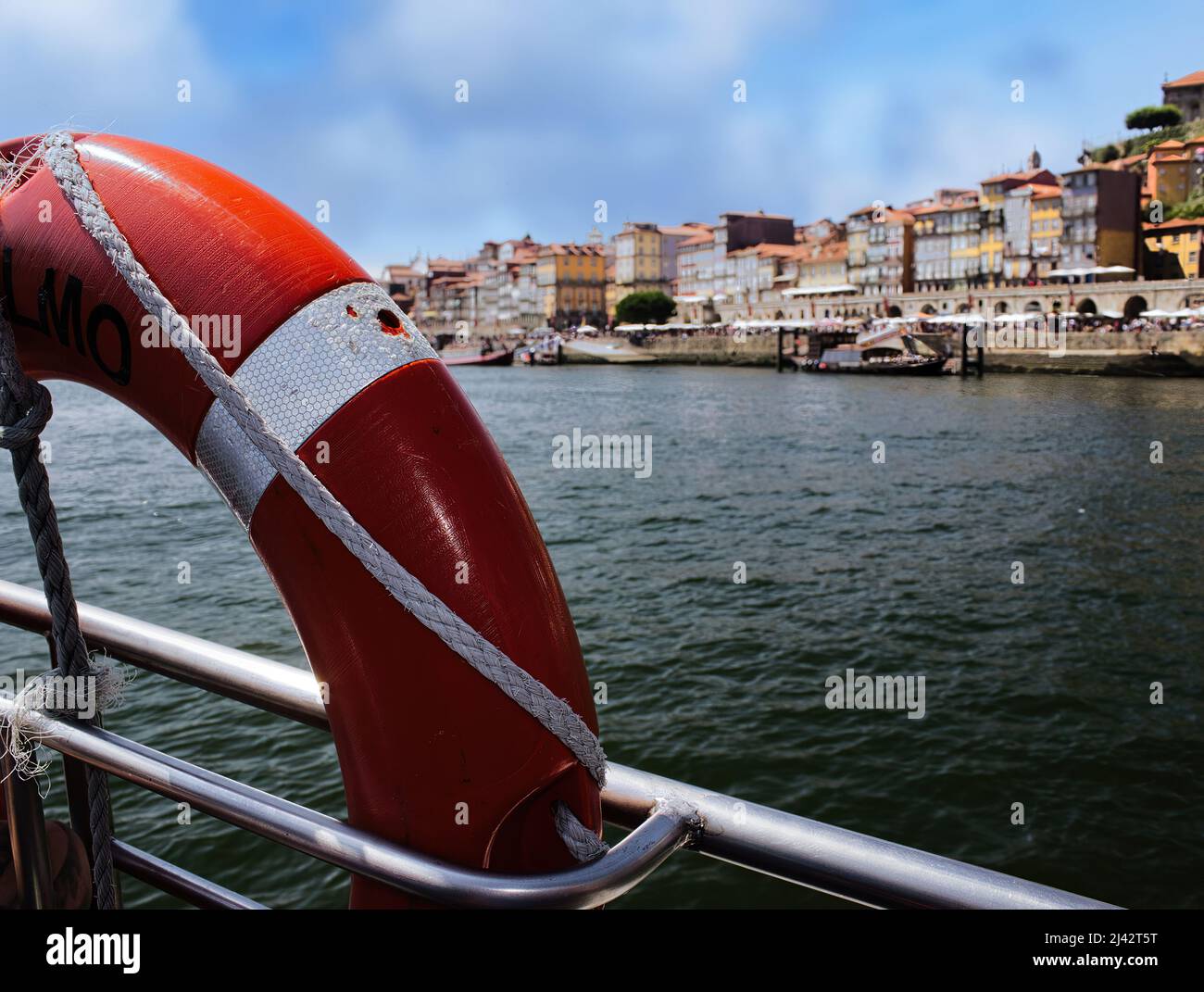 Navigation on the Douro river, against the backdrop of the old city of ...