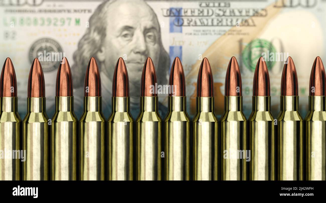 Gun lobby - Bullets in front of US dollar bill Stock Photo - Alamy