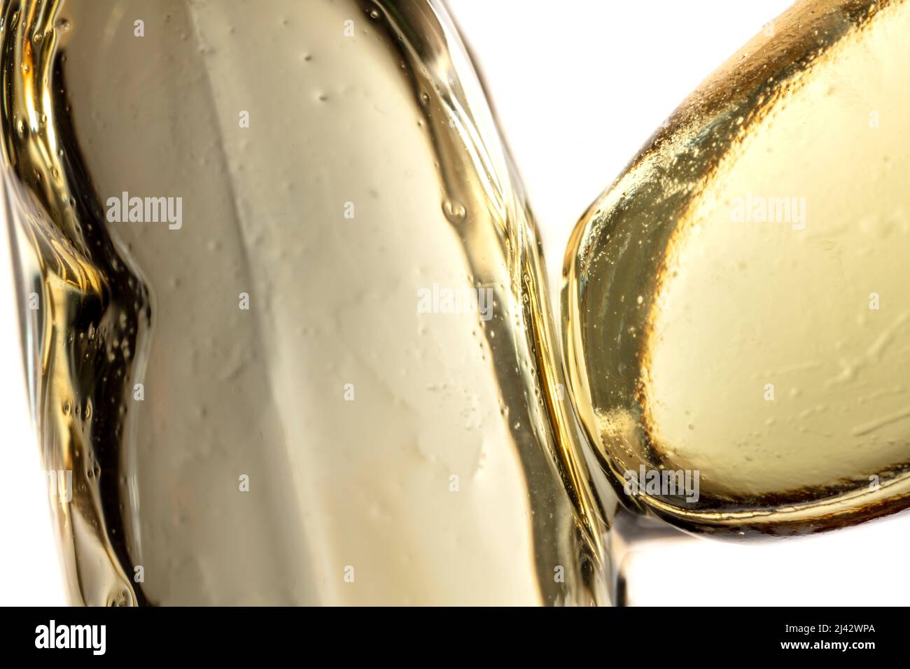 Macro still-life showing abstract patterns in Omega-3 oil capsule ...