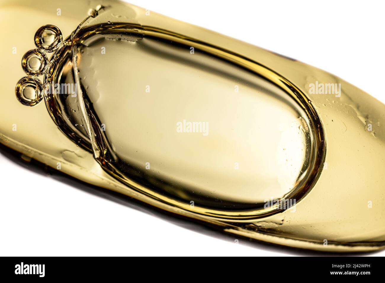 Macro still-life showing abstract patterns in Omega-3 oil capsule ...