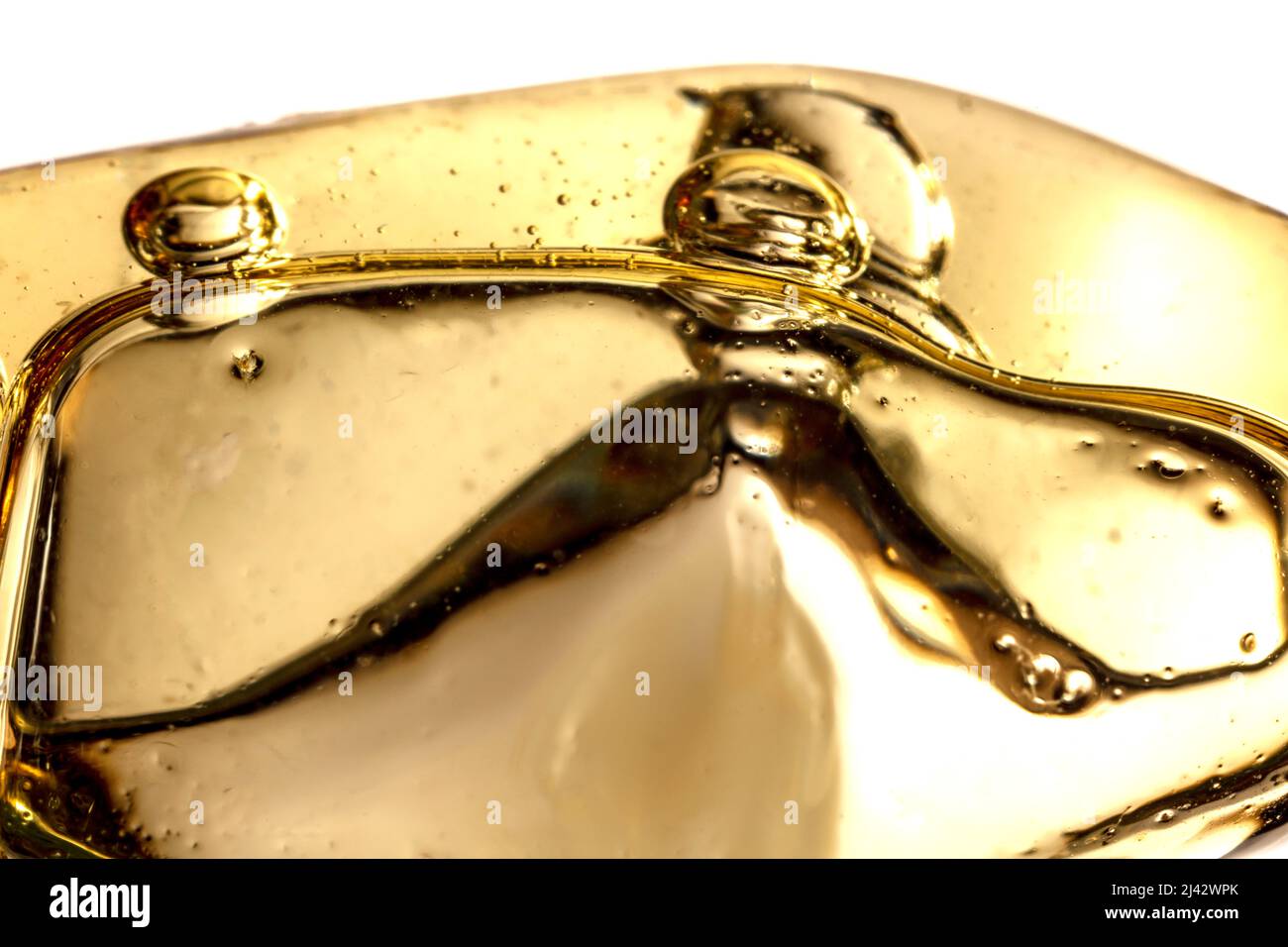 Macro still-life showing abstract patterns in Omega-3 oil capsule ...