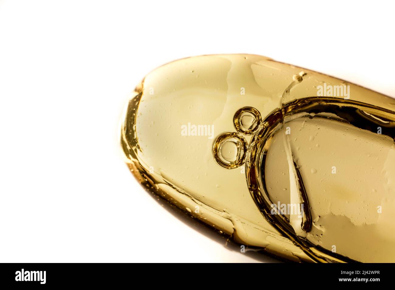 Macro still-life showing abstract patterns in Omega-3 oil capsule ...