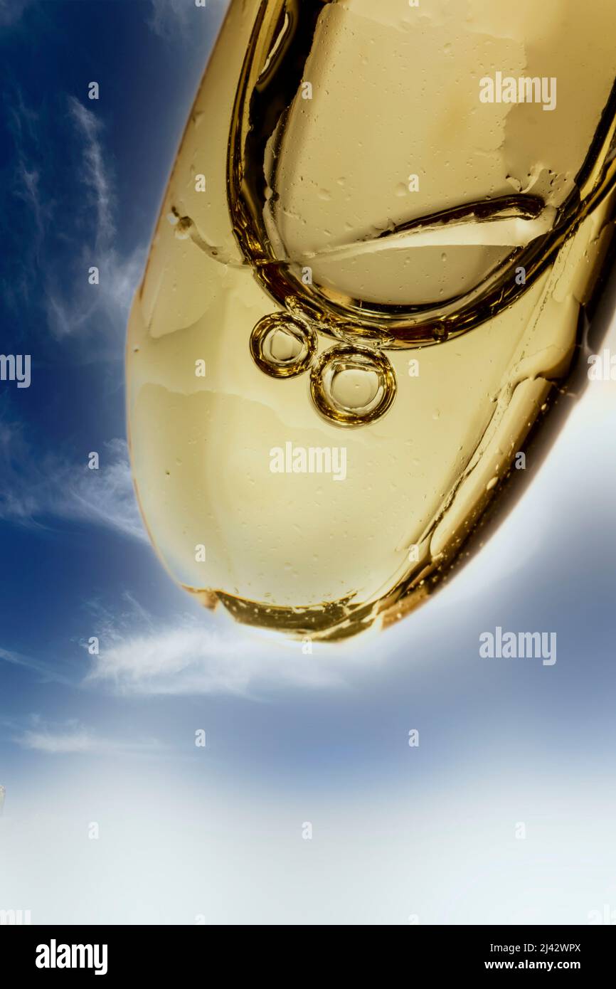 Macro still-life showing abstract patterns in Omega-3 oil capsule ...