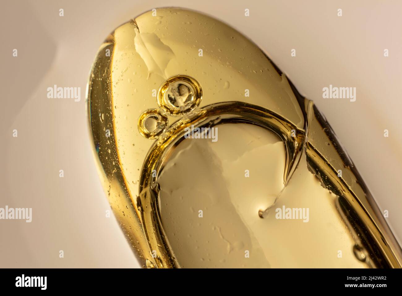 Macro still-life showing abstract patterns in Omega-3 oil capsule ...