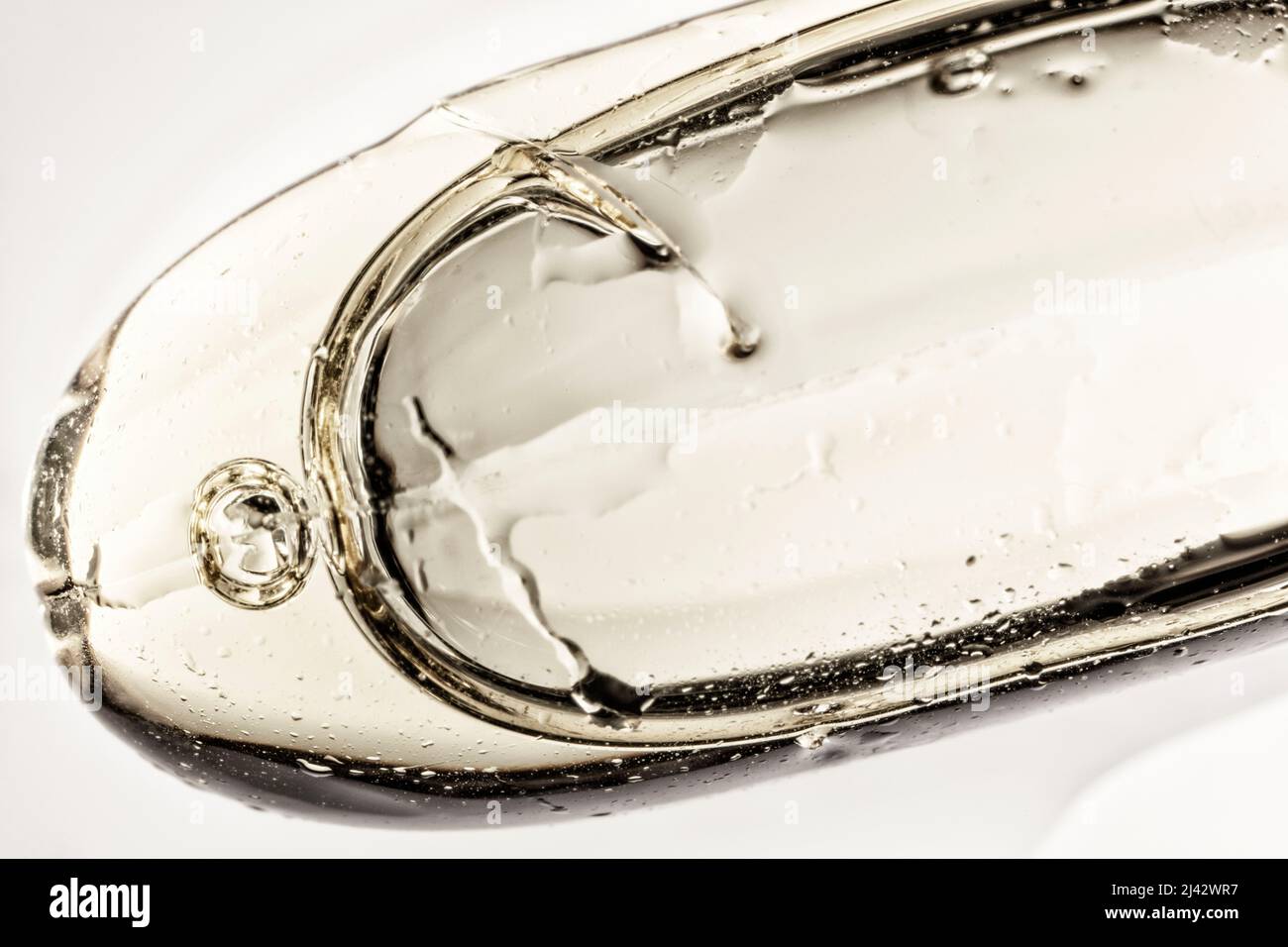 Macro still-life showing abstract patterns in Omega-3 oil capsule ...