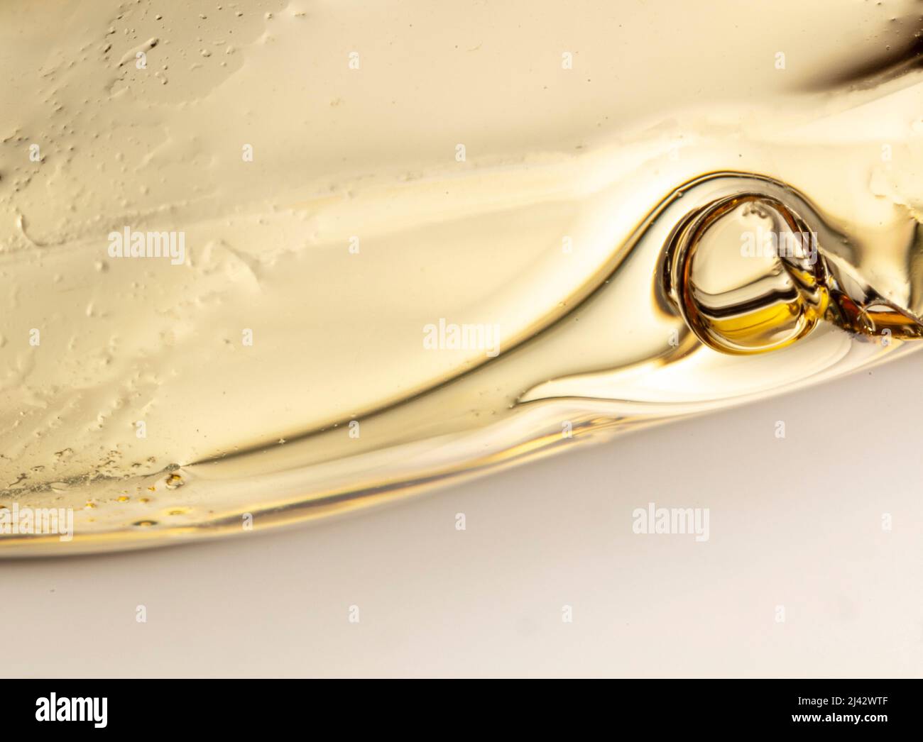 Macro still-life showing abstract patterns in Omega-3 oil capsule ...