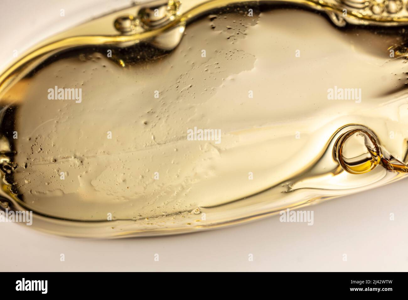 Macro still-life showing abstract patterns in Omega-3 oil capsule ...