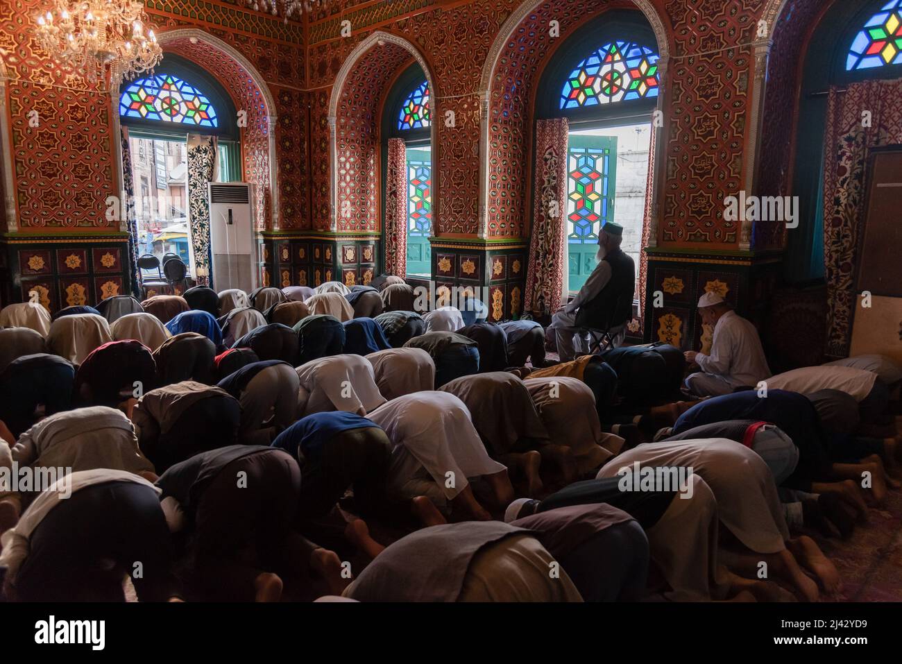 Muslim devotees offer evening prayers inside a shrine during Islamic ...