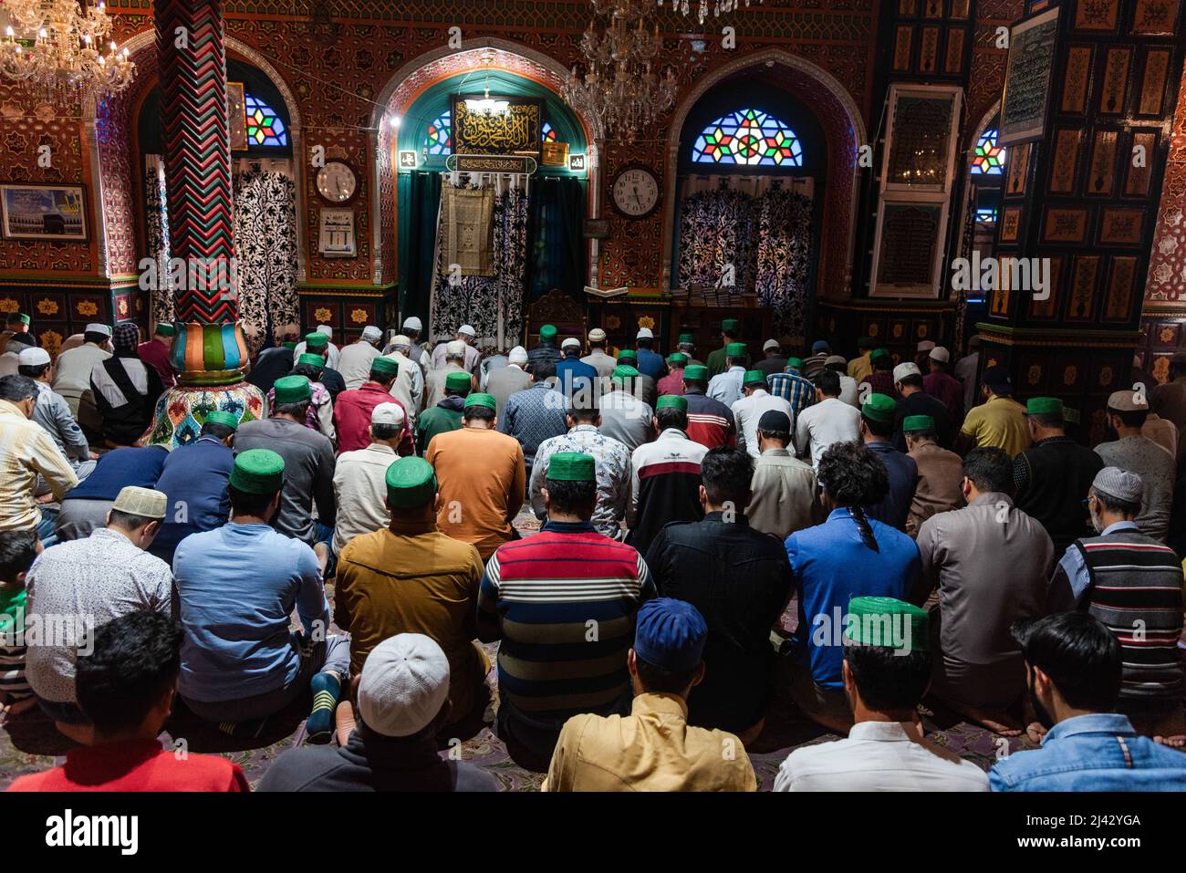 Muslim devotees offer evening prayers inside a shrine during Islamic ...
