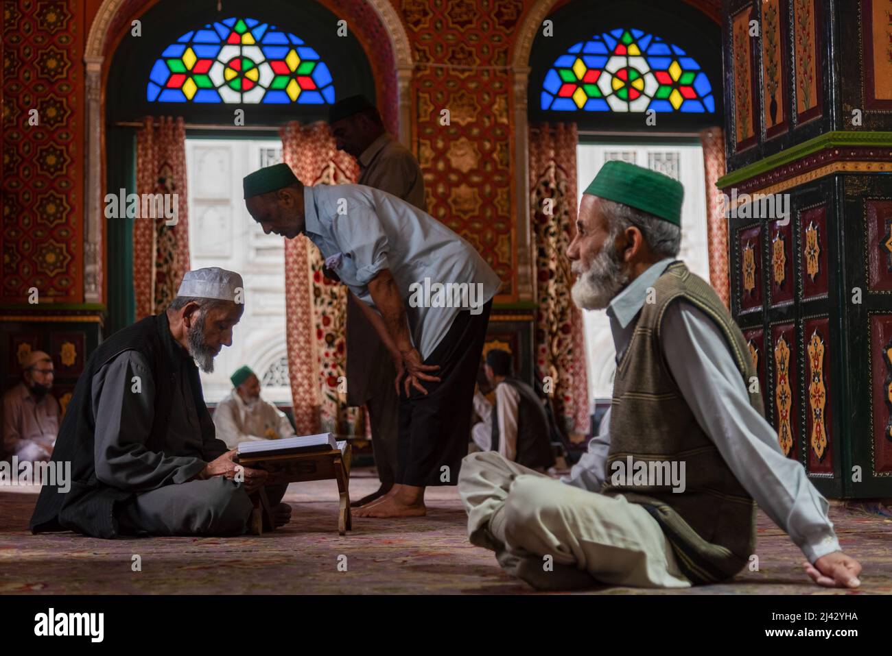 Muslim worshippers pray inside a shrine during Islamic holy month ...