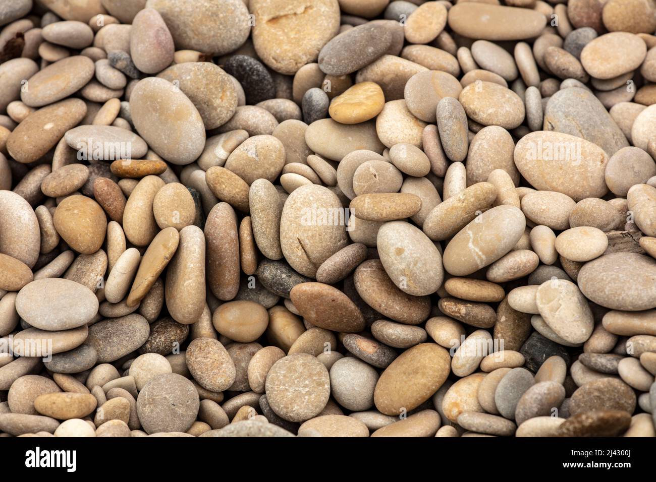 Random patterns in nature, small beach pebbles on the Costa Blanca ...