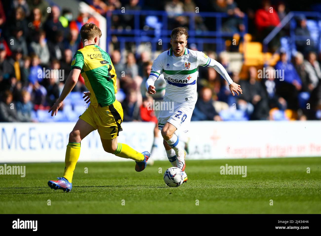 Elliott Nevitt (20) of Tranmere tries to get past James Connolly (2) of ...