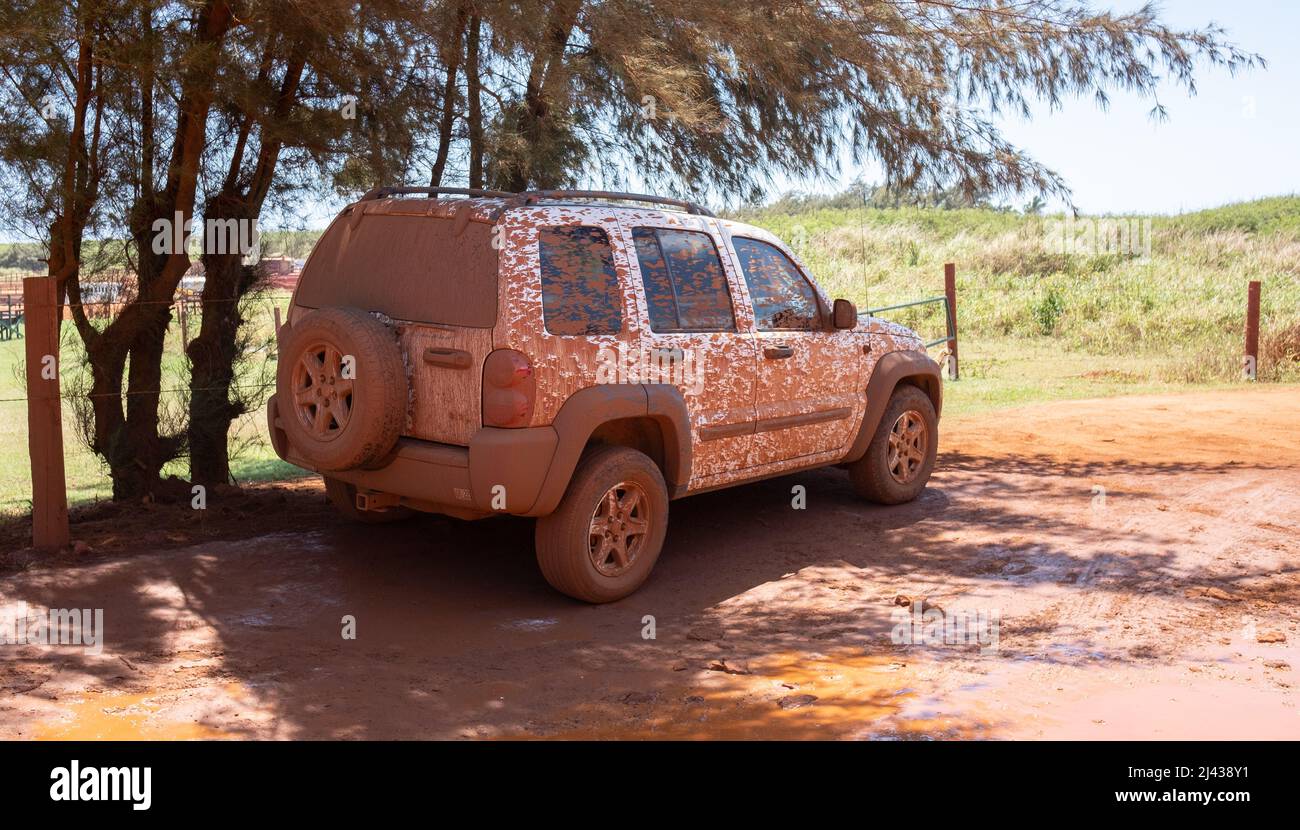 Car covered by splashed red mud Stock Photo - Alamy