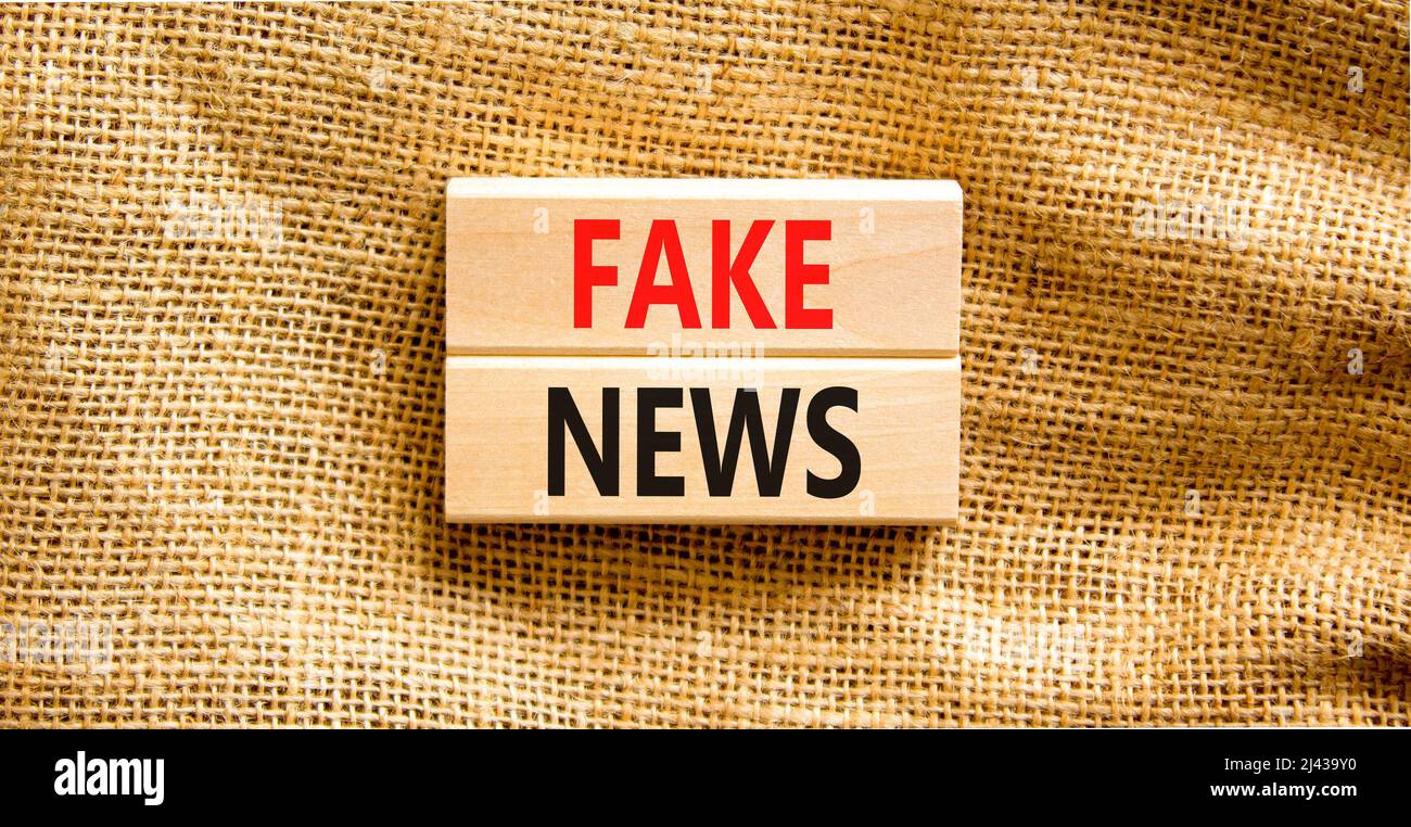 Fake news symbol. Wooden blocks with concept words Fake news on ...