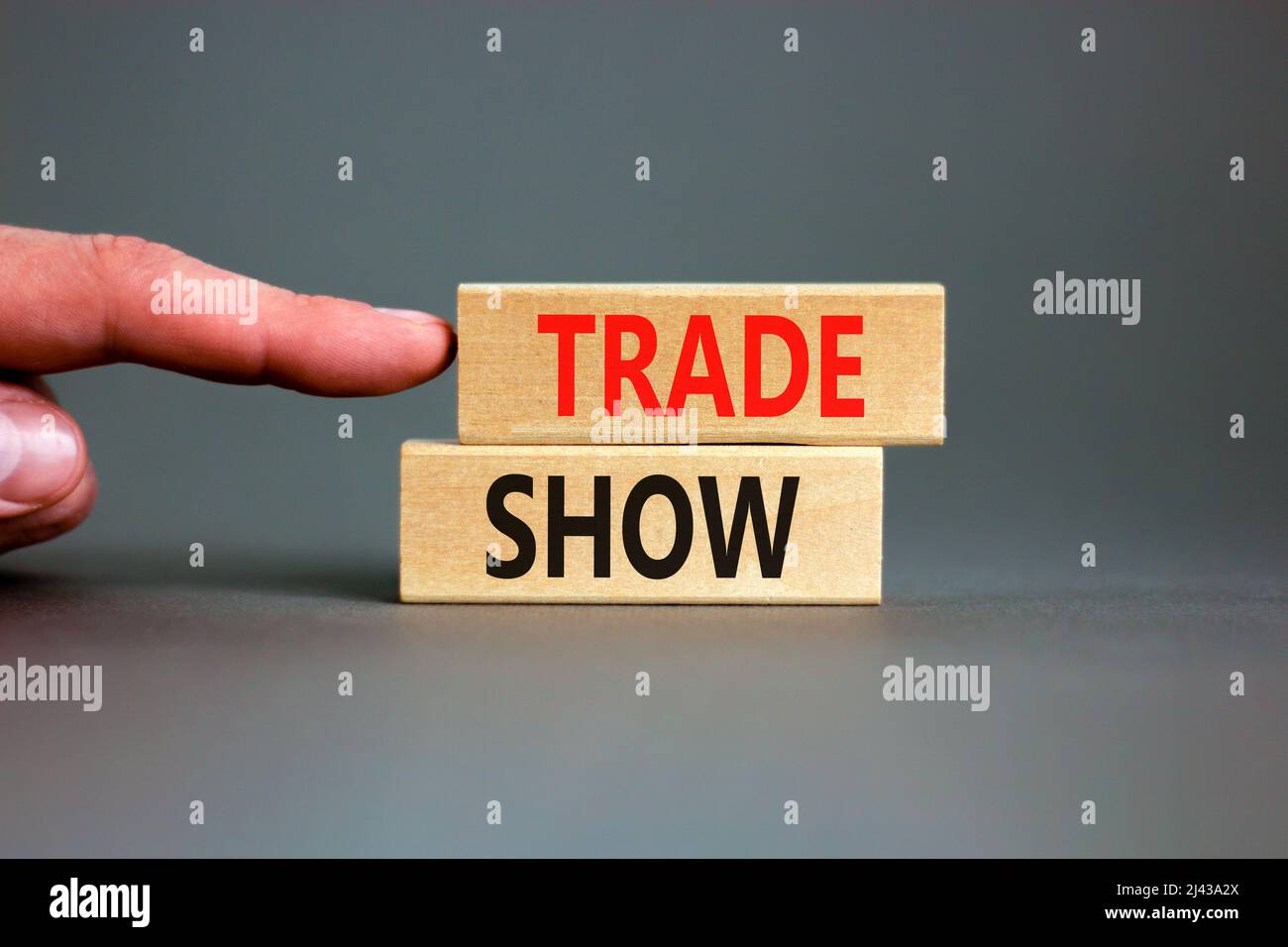 Trade show symbol. Wooden blocks with concept words Trade show on ...