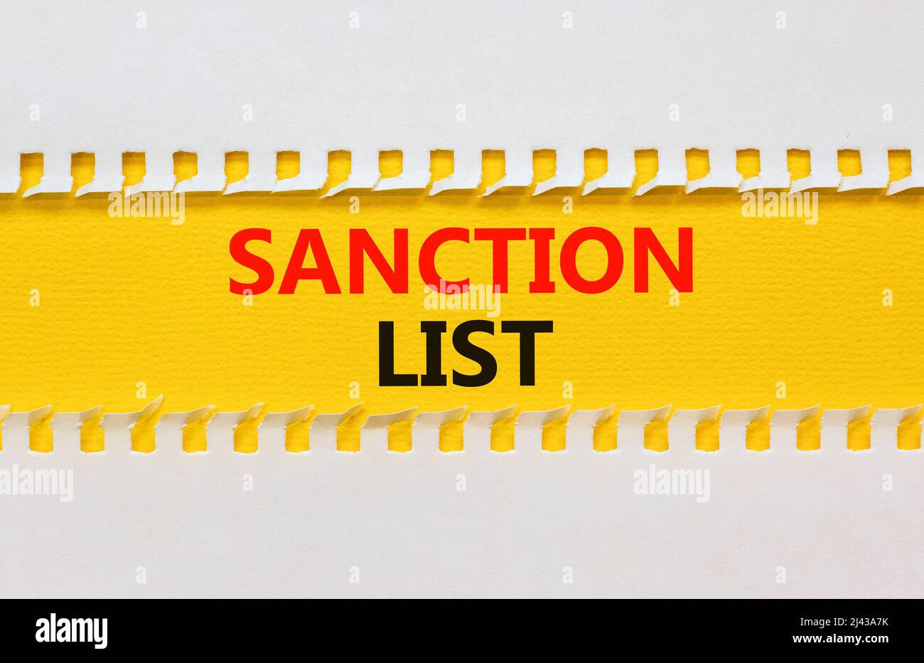 Sanction list symbol. Yellow and white paper with concept words ...