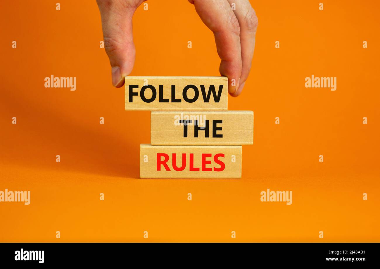 Follow the rules symbol. Concept words Follow the rules on wooden ...