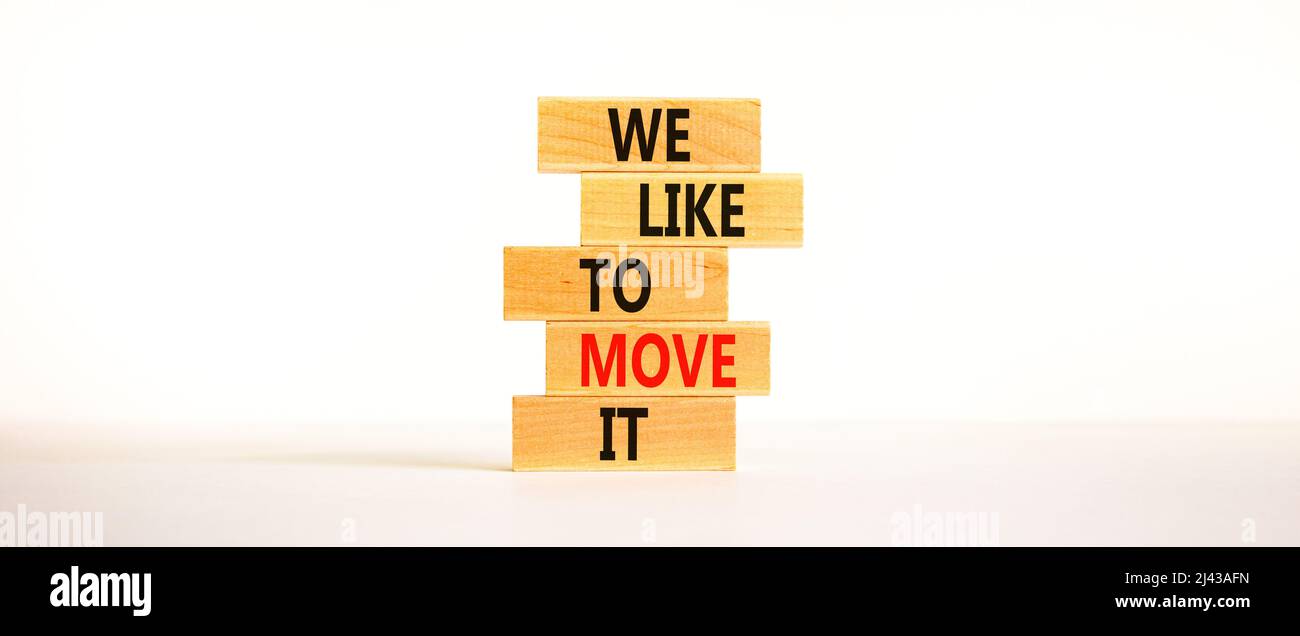 We like to move it symbol. Concept words We like to move it on wooden ...