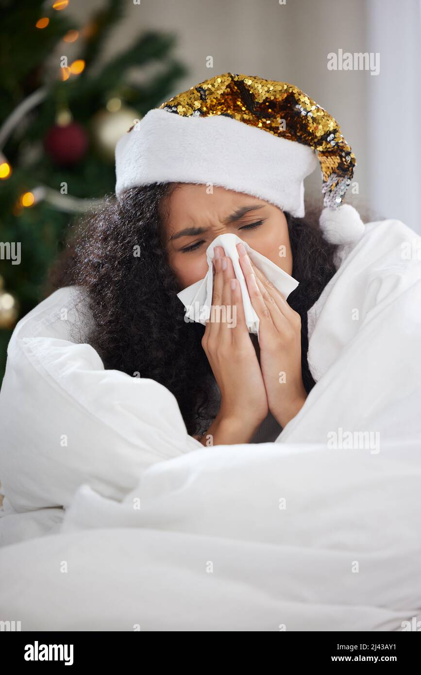 Shes got a case of the Christmas sniffles. Cropped shot of an ...