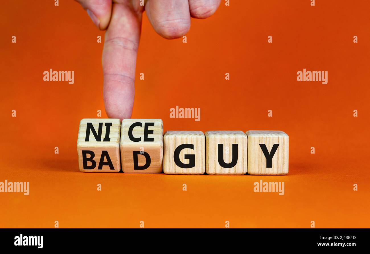 Nice or bad guy symbol. Businessman turns cubes and changes concept ...