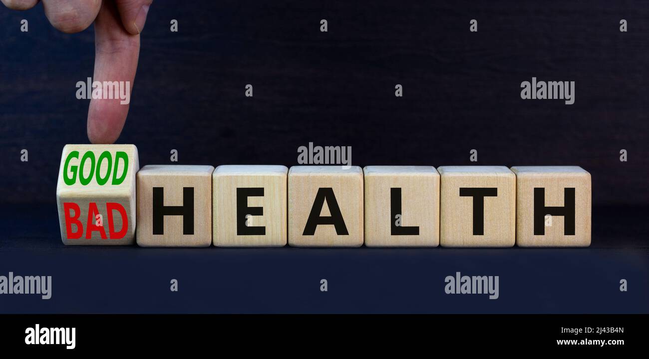 Good or bad health symbol. Turned wooden cubes and changed concept ...