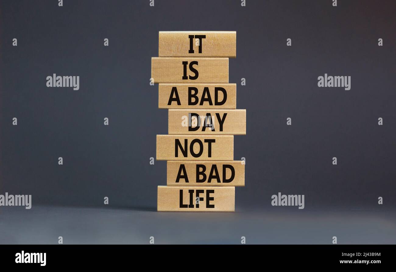 Bad day or life symbol. Wooden blocks with concept words It is a bad ...