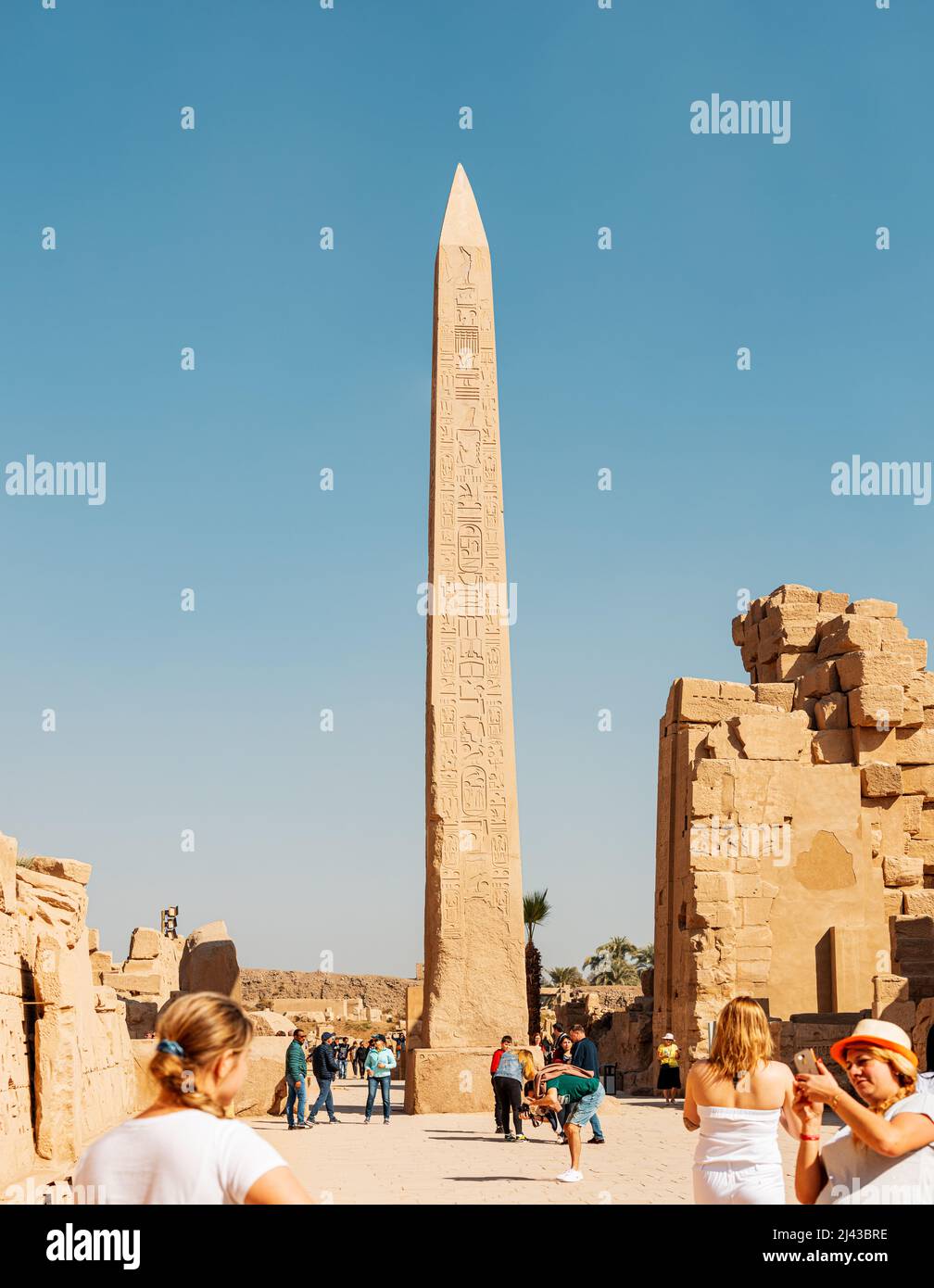 11 January 2022, Luxor, Egypt: Crowds of tourists walk through the ...