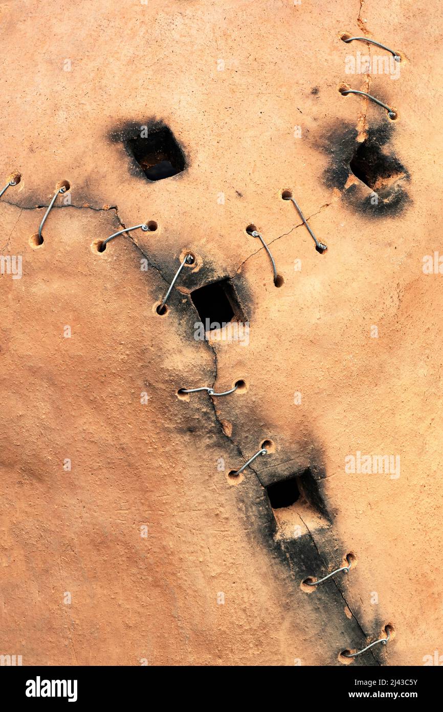 background or texture detail of a cracked fireclay furnace Stock Photo ...