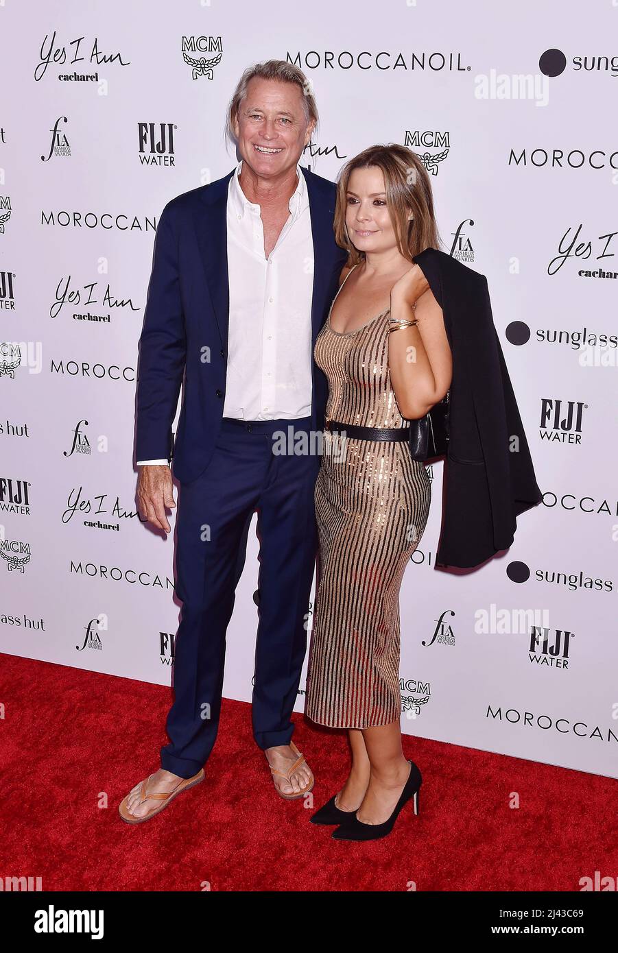 BEVERLY HILLS, CA - APRIL 10: (L-R) Russell James and Ali Franco attend ...