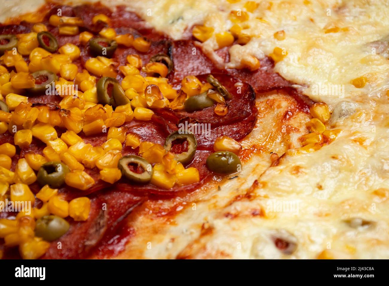 food background detail view of the surface of a decorated pizza Stock ...