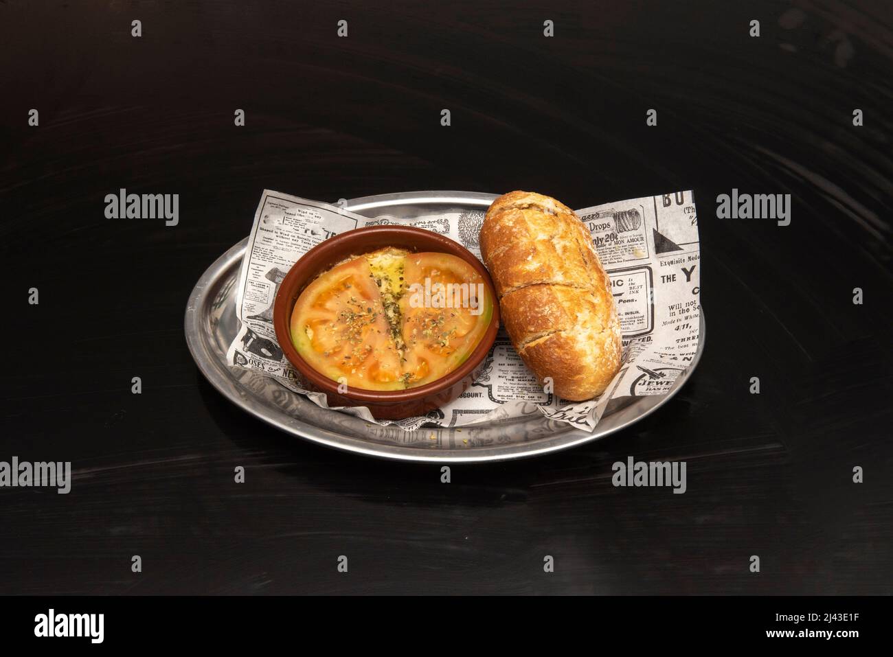 Baked provolone with tomato. A recipe with very few ingredients. And ...