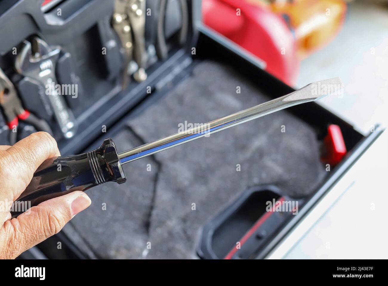 Holding toolbox and drill hi-res stock photography and images - Alamy