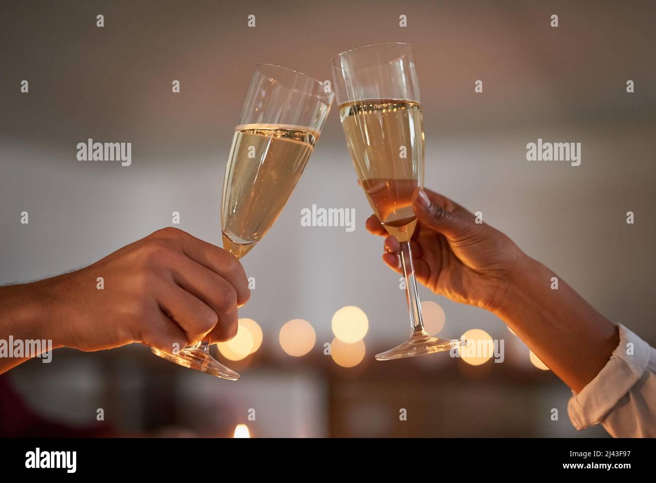 Relaxed evening hands holding glasses hi-res stock photography and ...