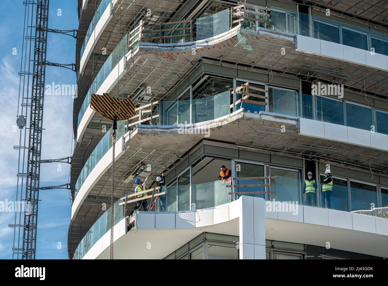 Limassol, Cyprus - February 10, 2022: Workers at the high-rise building ...