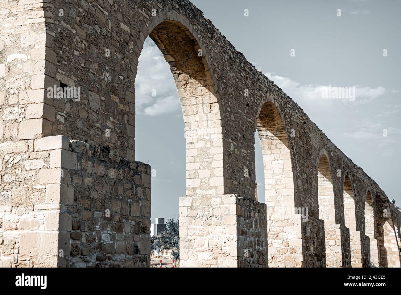 Stone built arches of Kamares Aqueduct in Larnaca, Cyprus Stock Photo ...