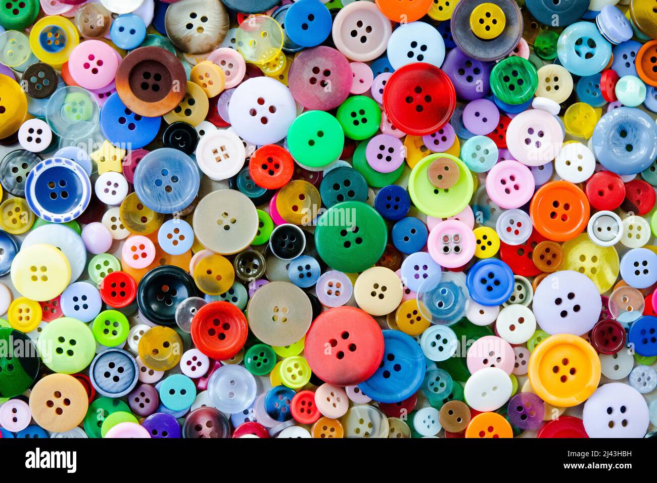 Colorful mixed sewing buttons background. Top view Stock Photo - Alamy