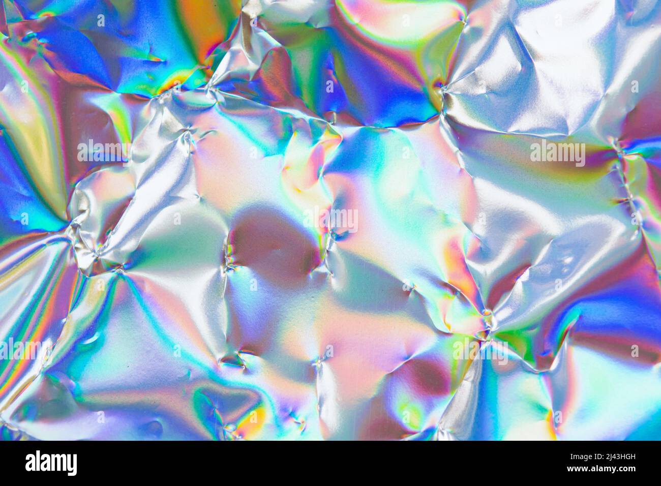 Holographic iridescent background. holographic foil texture background ... Holographic iridescent background. holographic foil texture background ...