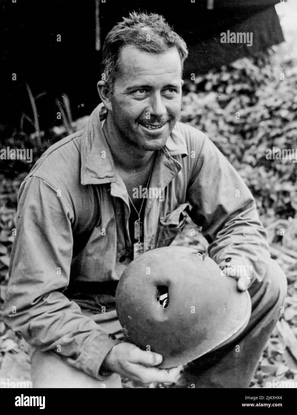 Captain Edward Wright with bullet punched holes in Steel Helmet ...