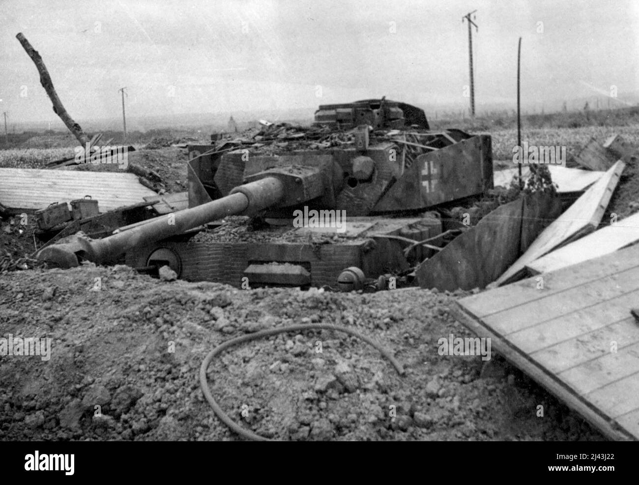 The Aftermath of Battle A Dug - In German tank which was knocked out ...