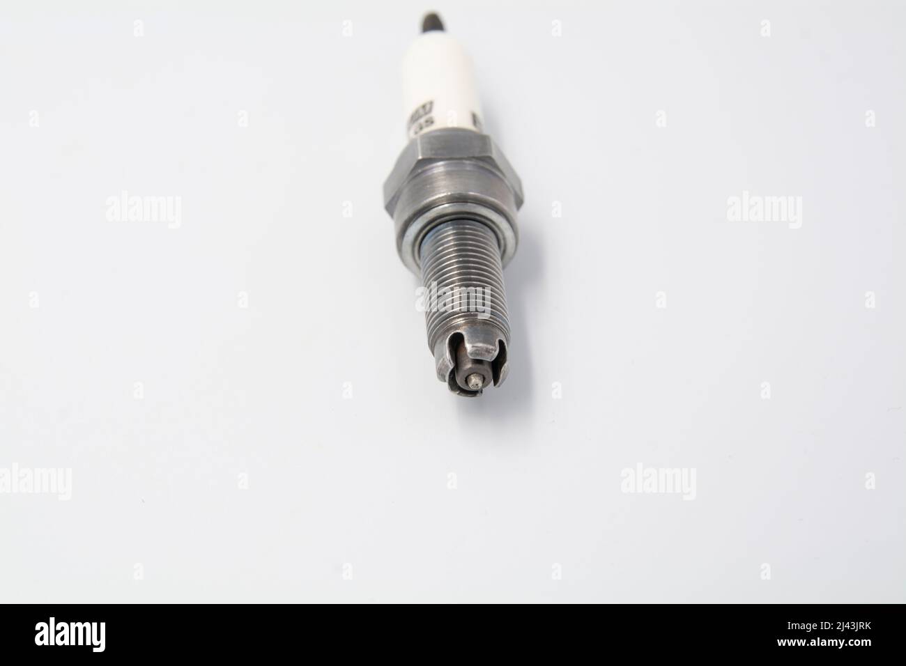 Spark plug types, old 4-prong spark plug Stock Photo - Alamy