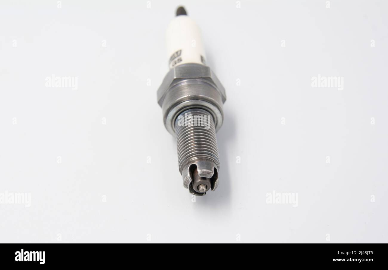 Spark plug types, old 4-prong spark plug Stock Photo - Alamy
