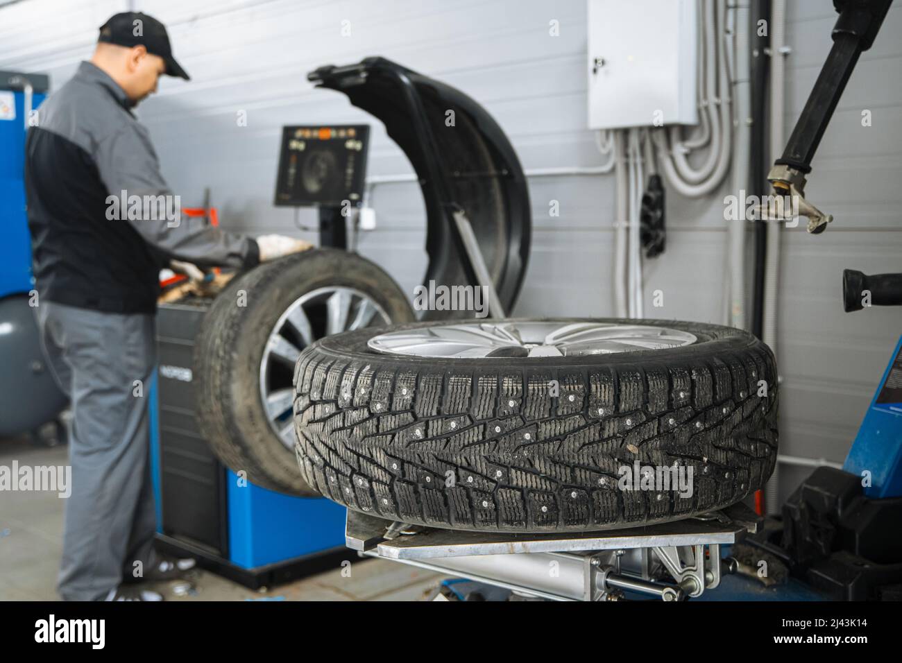 Car wheel and tire fitting equipment Stock Photo - Alamy
