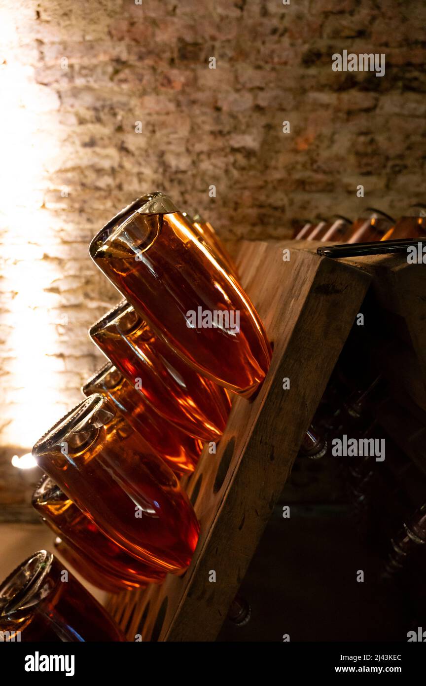 Sparkling white and rose wine production by traditional method in ...