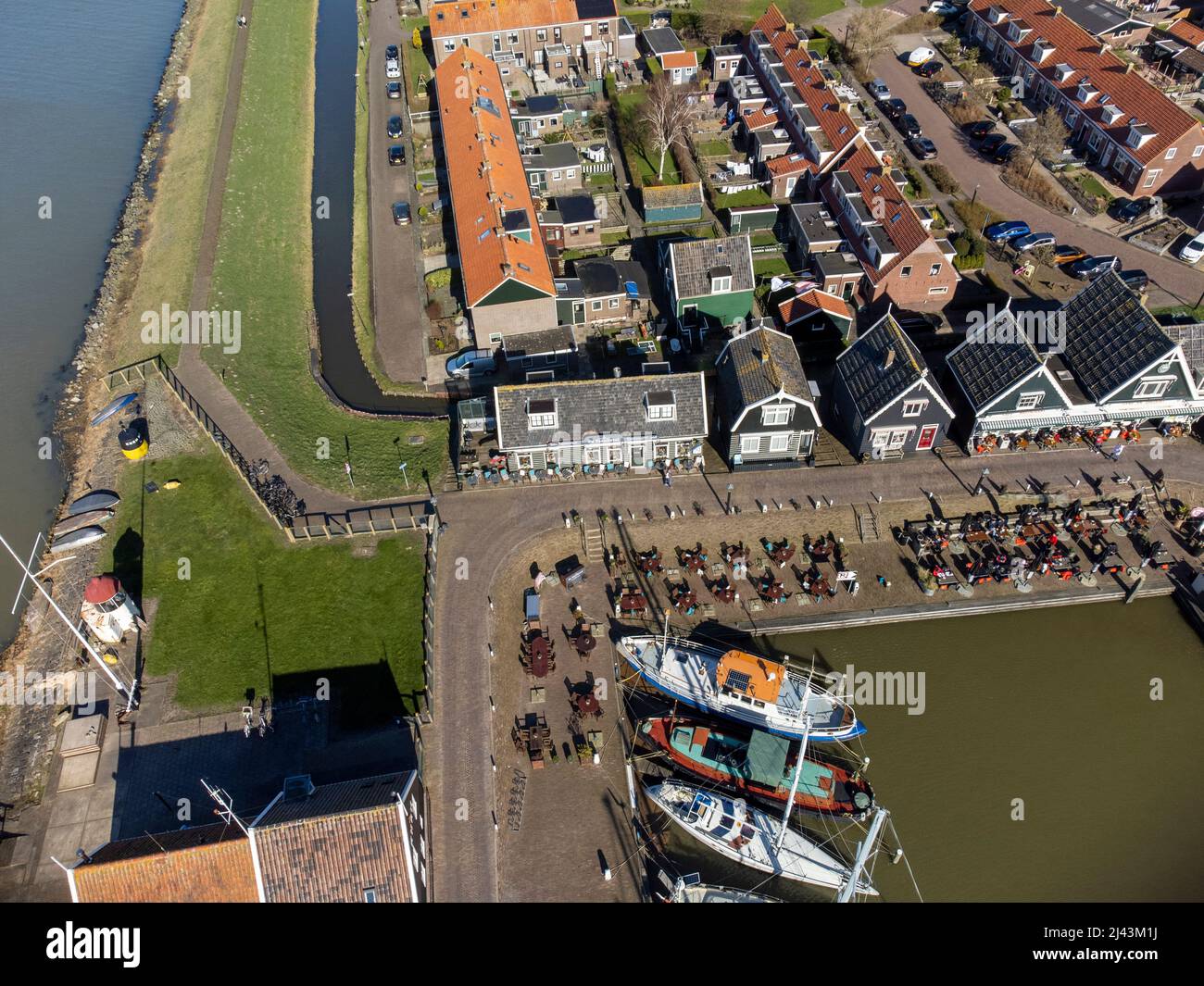 Aerial view on small Dutch town Marken with wooden houses located on ...